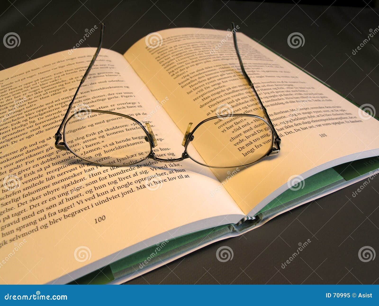 Glasses on book stock image. Image of book, essay, hardback - 70995