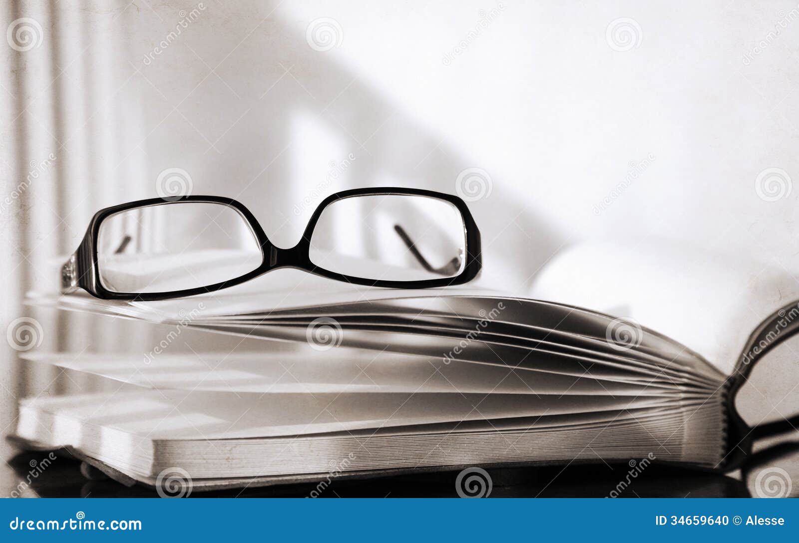 Glasses and book stock photo. Image of monochrome, retro - 34659640