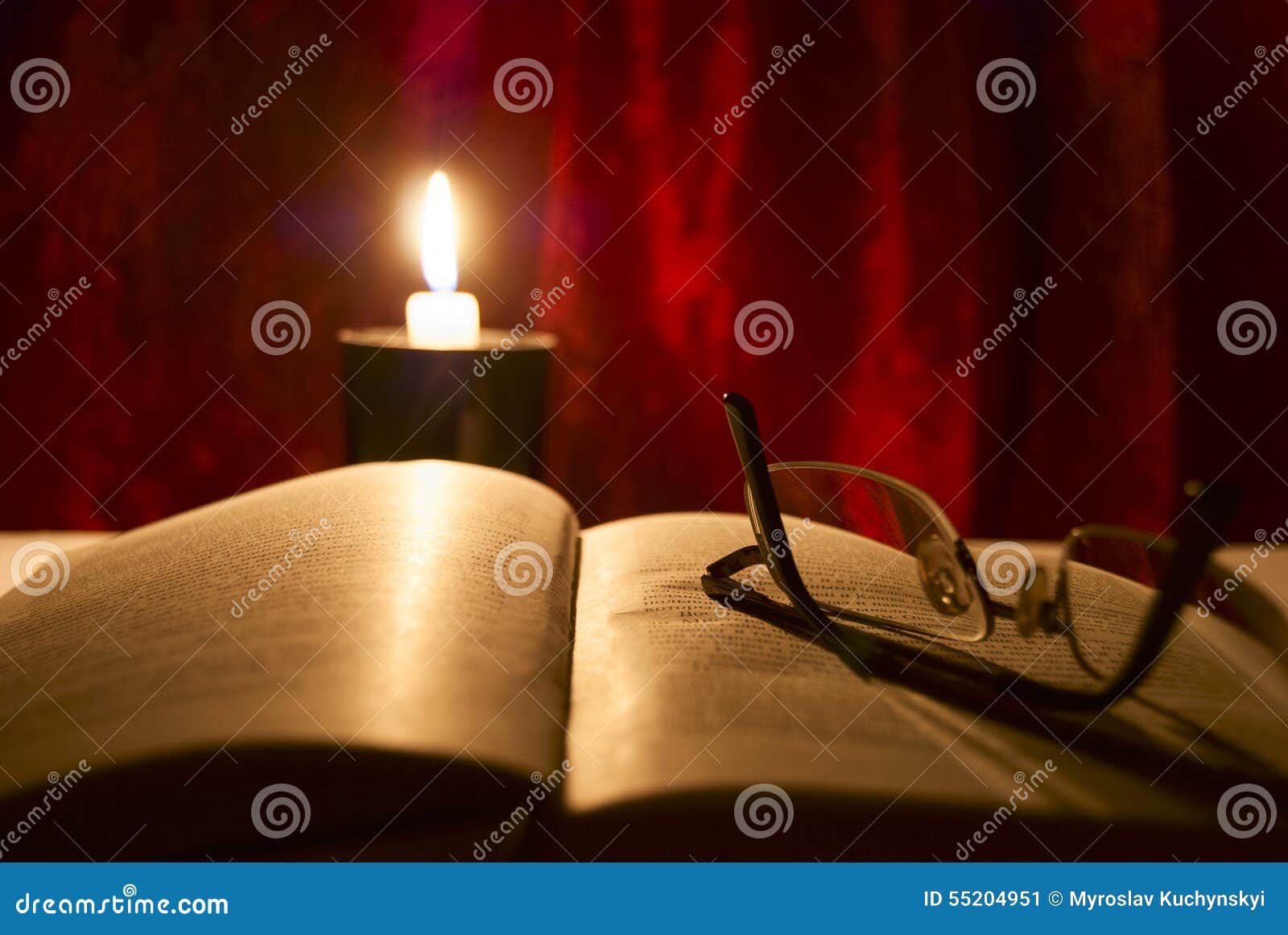Glasses, book and candle stock image. Image of candles - 55204951