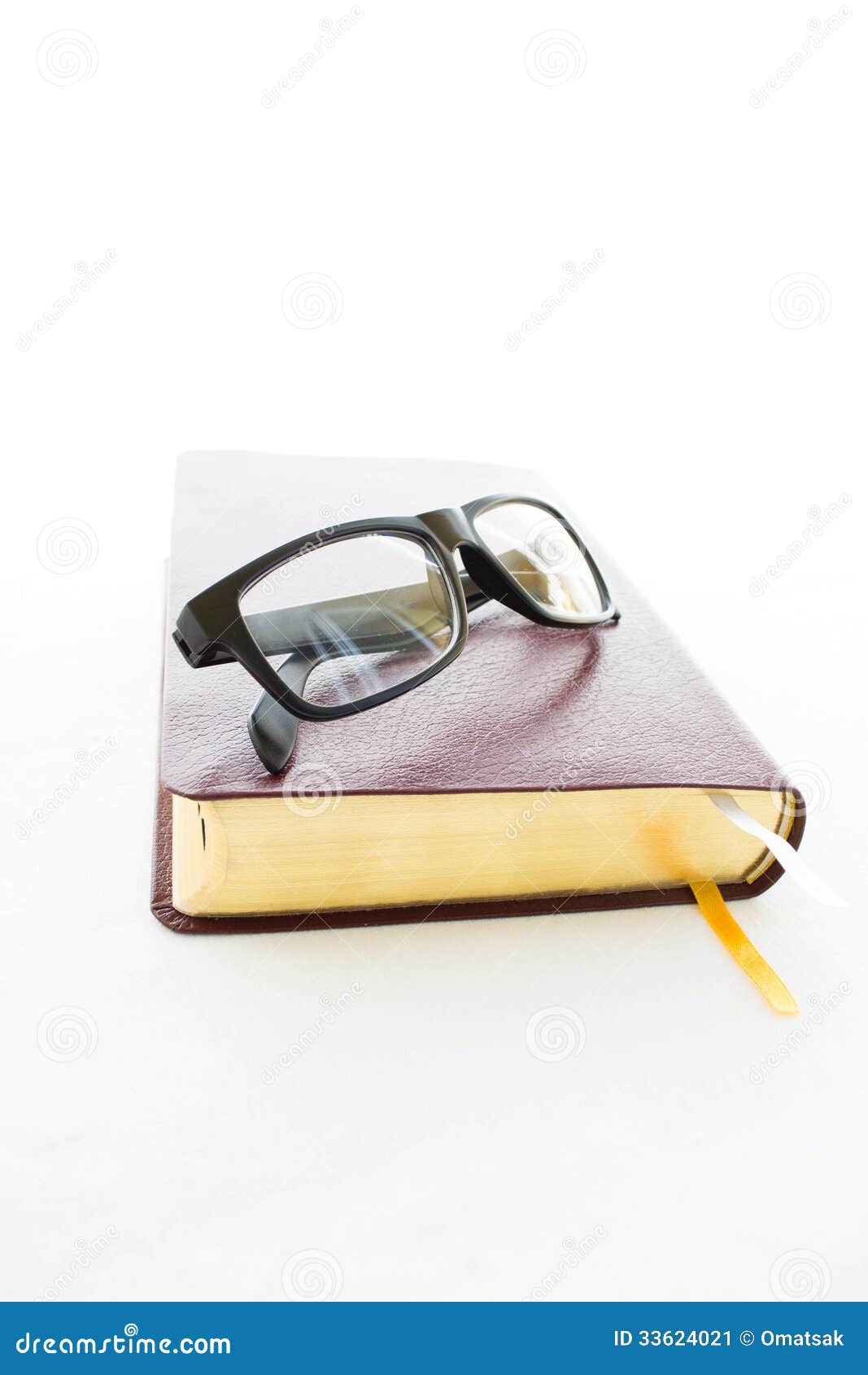 Glasses on a book stock image. Image of paper, book, medium - 33624021