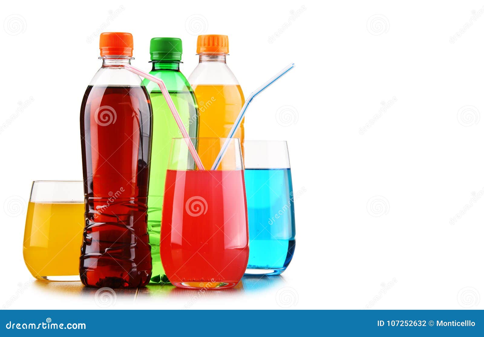 Glasses and Bottles of Assorted Carbonated Soft Drinks Stock Photo ...