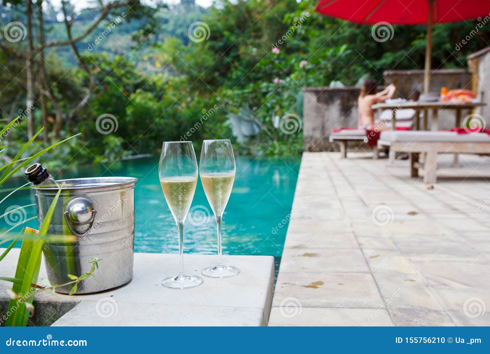 Glasses of Champagne Near Pool Stock Photo - Image of lifestyle, hotel ...