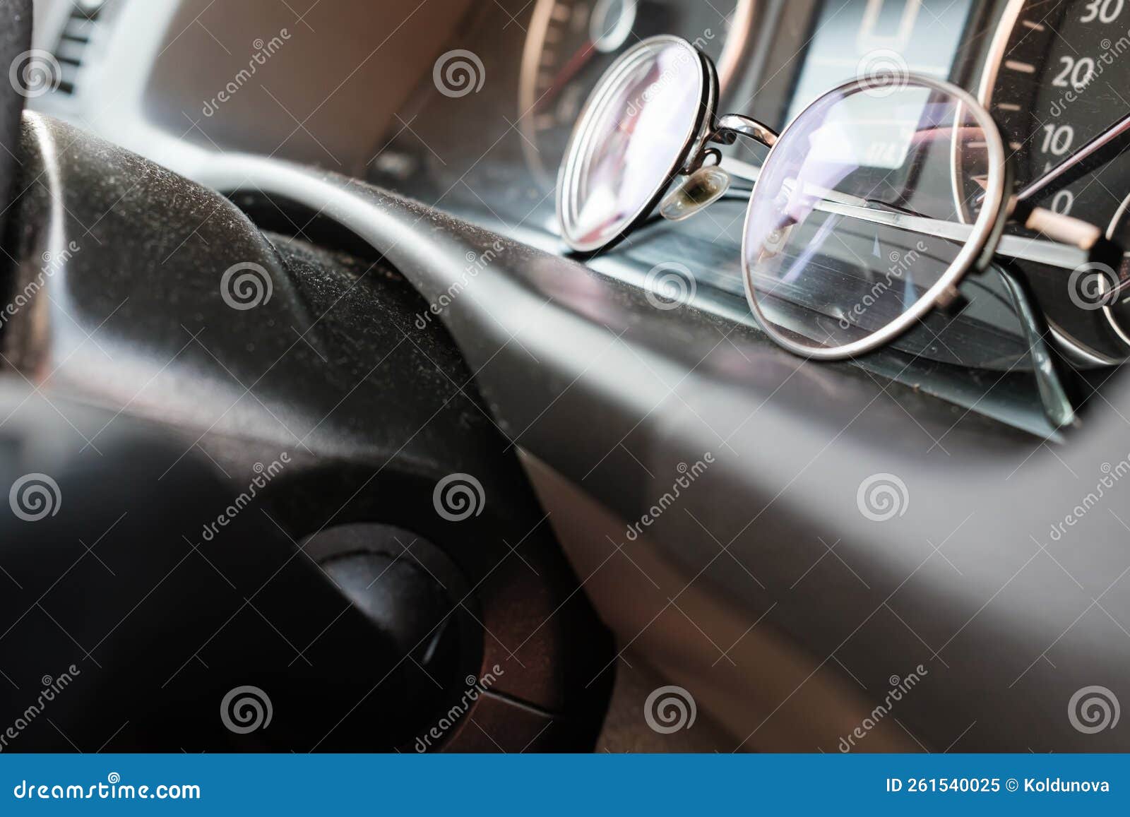 Glasses on the Dashboard of a Car. Accessory for Drivers with Vision ...