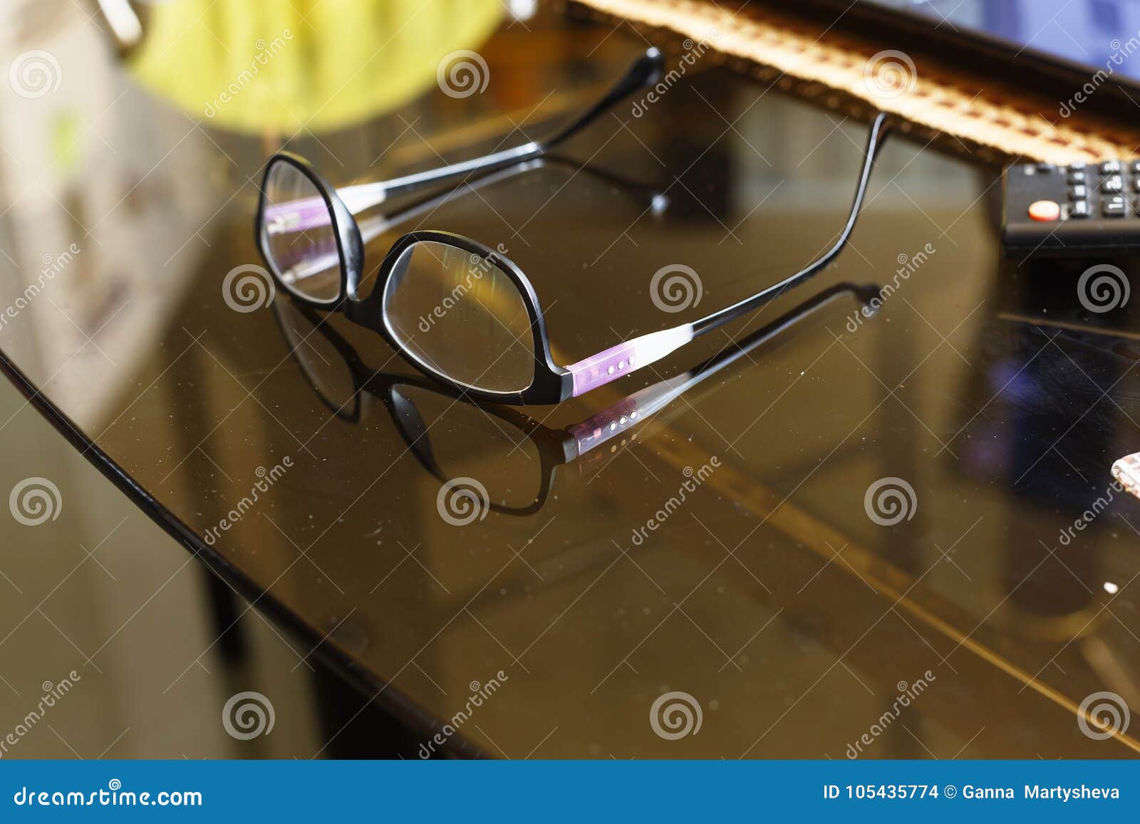 Glasses on a Desk in the Office. Glasses on a Transparent Desk in the ...