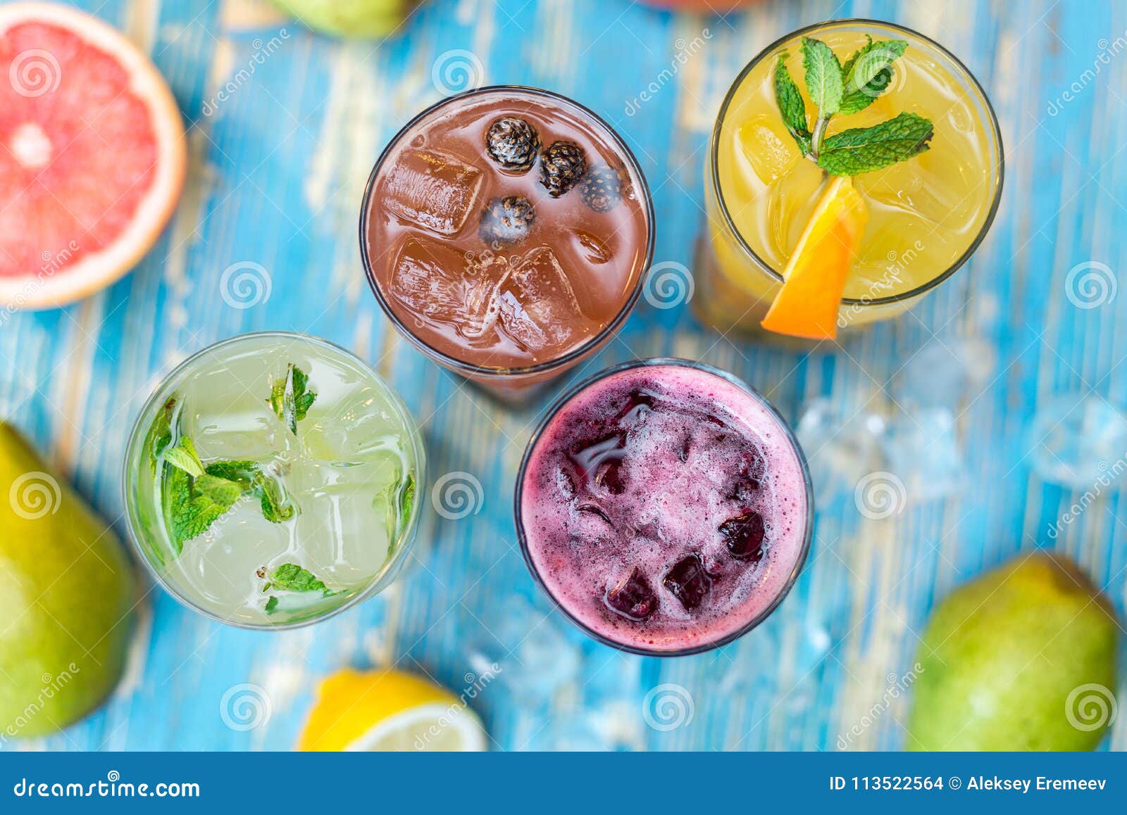 Glasses with Different Refreshing Drinks and Fruits Stock Photo - Image ...