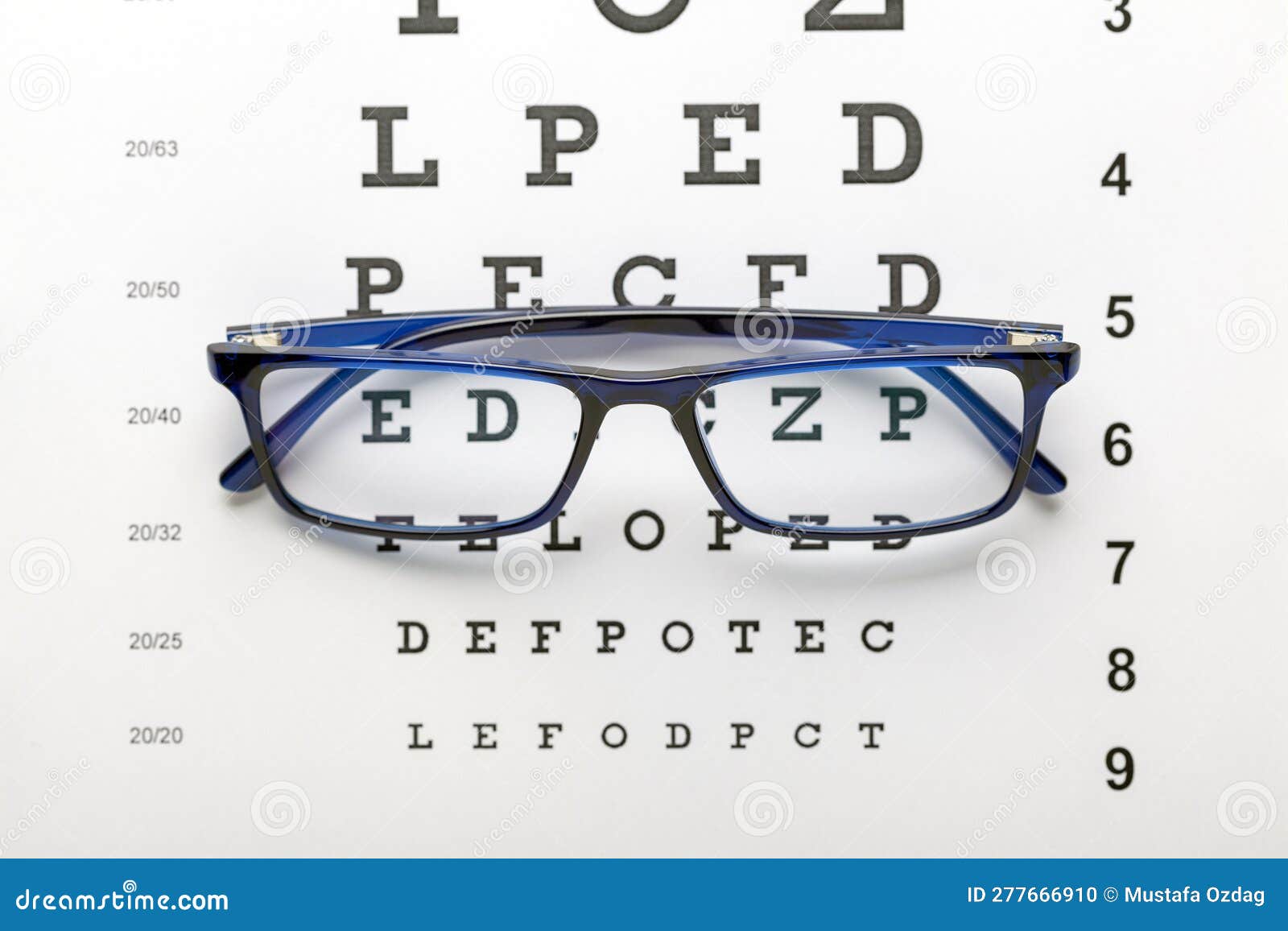Glasses on an Eye Check Chart Stock Photo - Image of vision, test ...