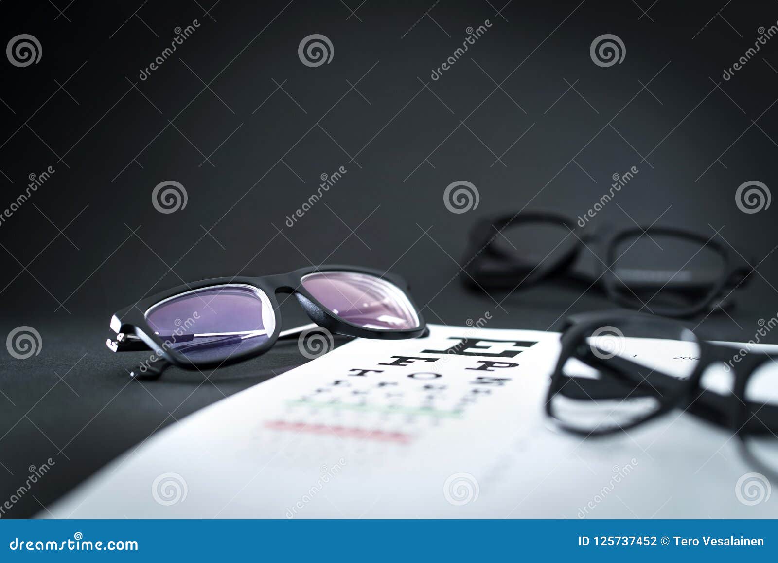 Glasses on Eye Sight Test Chart with Different Spectacle Options. Stock ...
