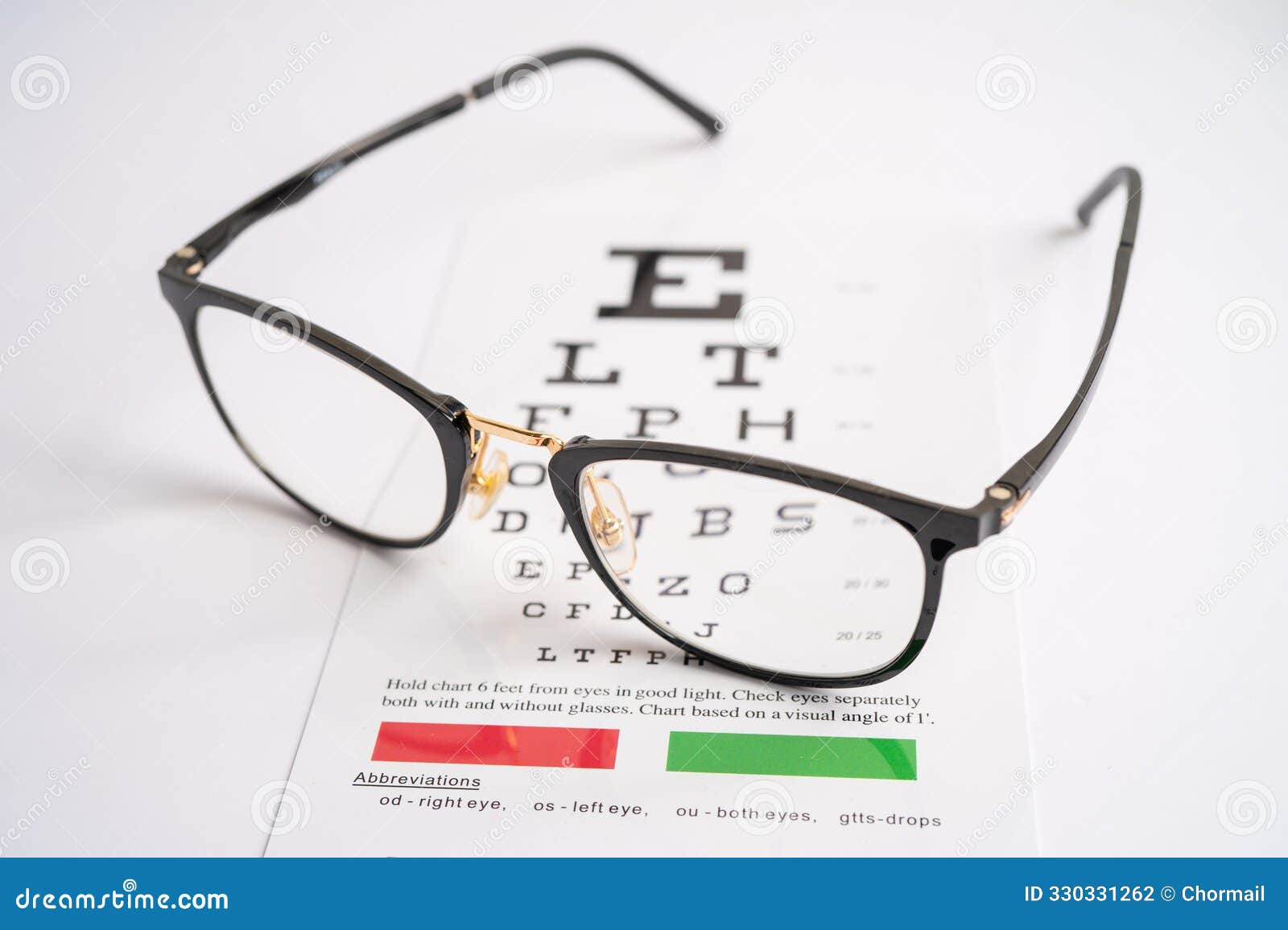 Glasses on Eye Testing Exam Chart To Check Eyesight Accuracy of Reading ...
