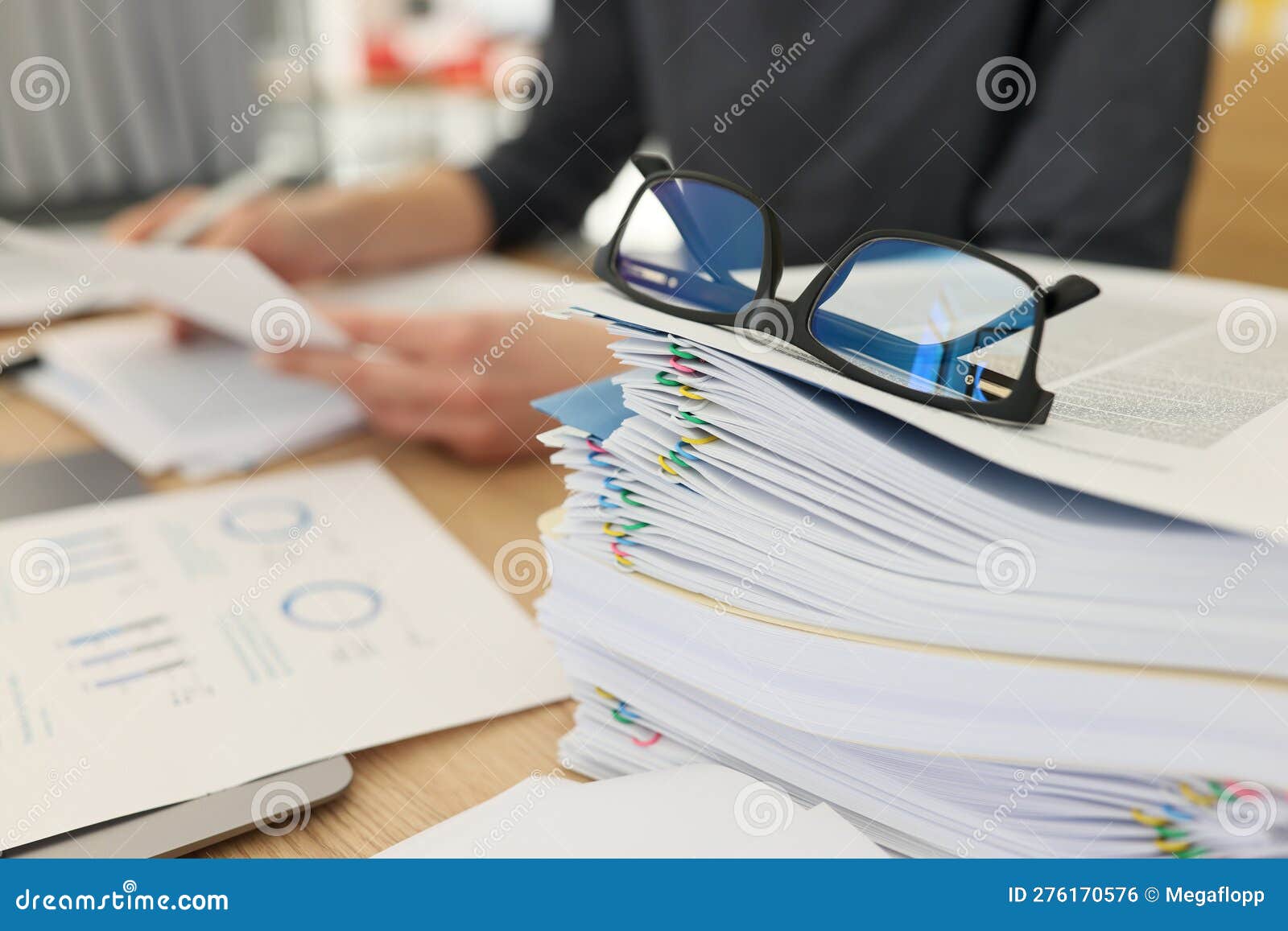 Glasses for Eyesight Lie on Stack of Documents at Workplace Stock Photo ...