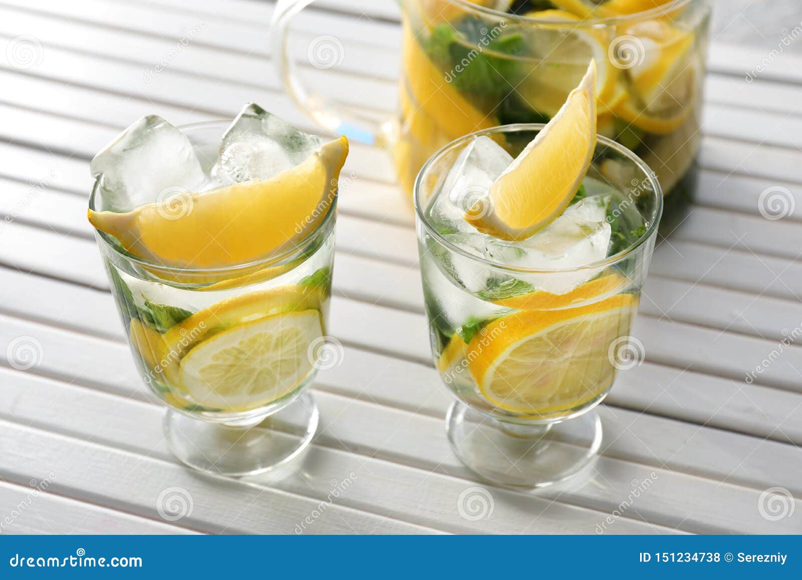 Glasses of Fresh Lemonade on White Wooden Table Stock Photo - Image of ...