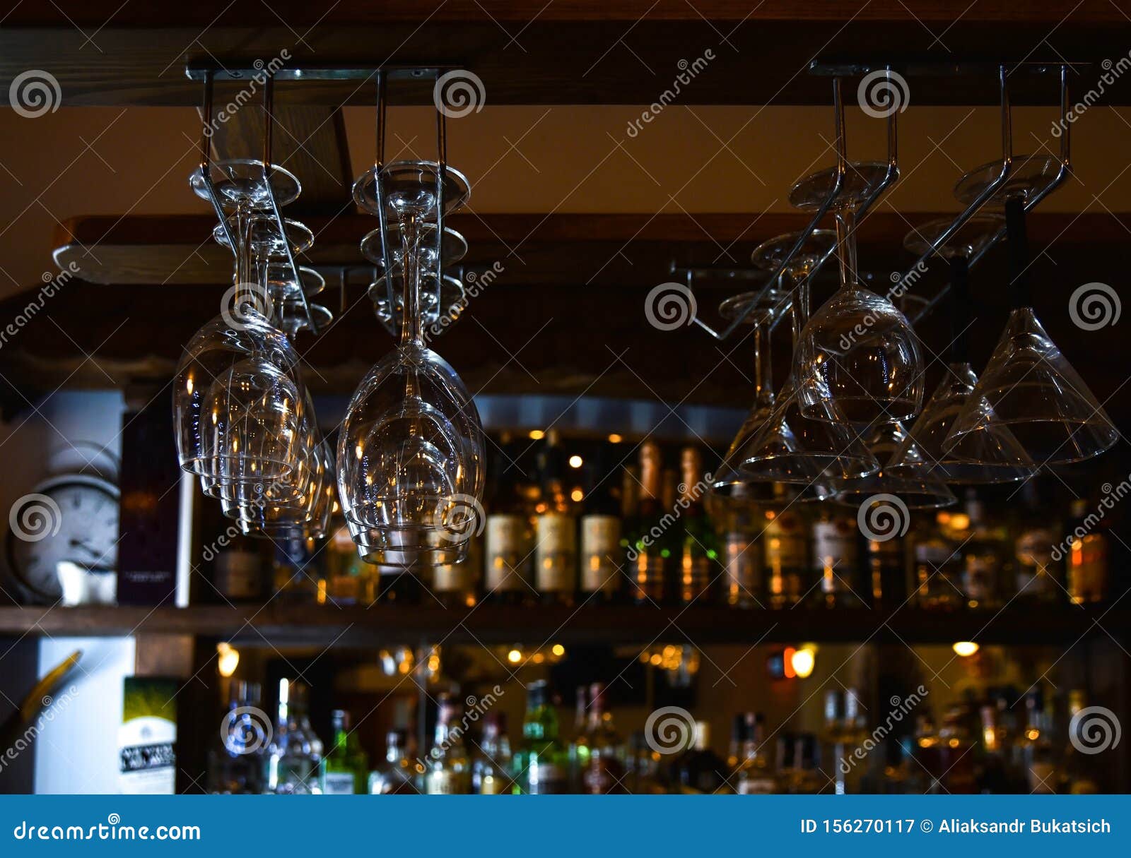 Glasses Hang Down Over the Bar Stock Image - Image of restaurant, shelf ...