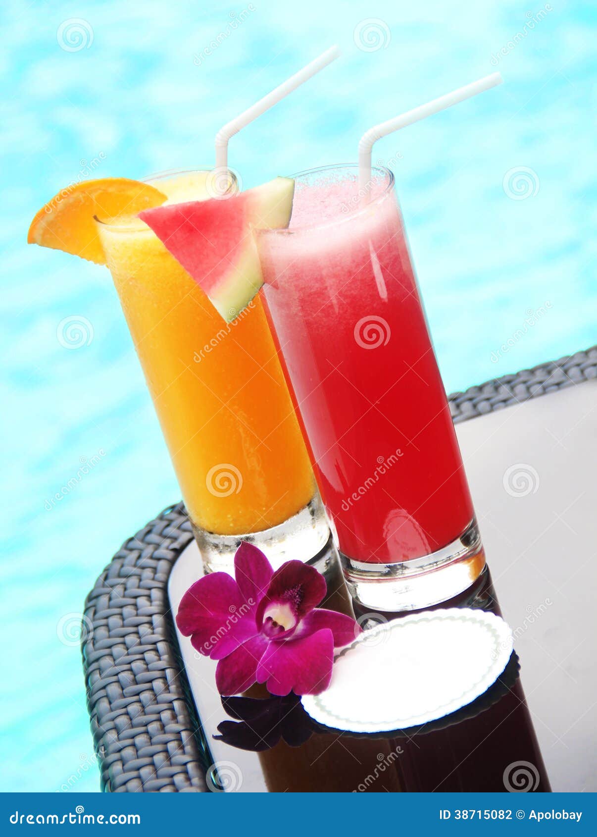 Glasses of Juice by the Swimming Pool Stock Photo - Image of luxury ...