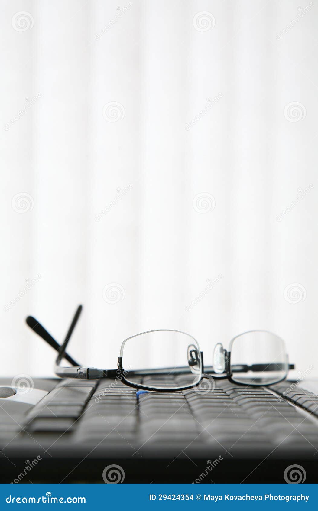 Glasses on Laptop Keyboard stock photo. Image of education - 29424354