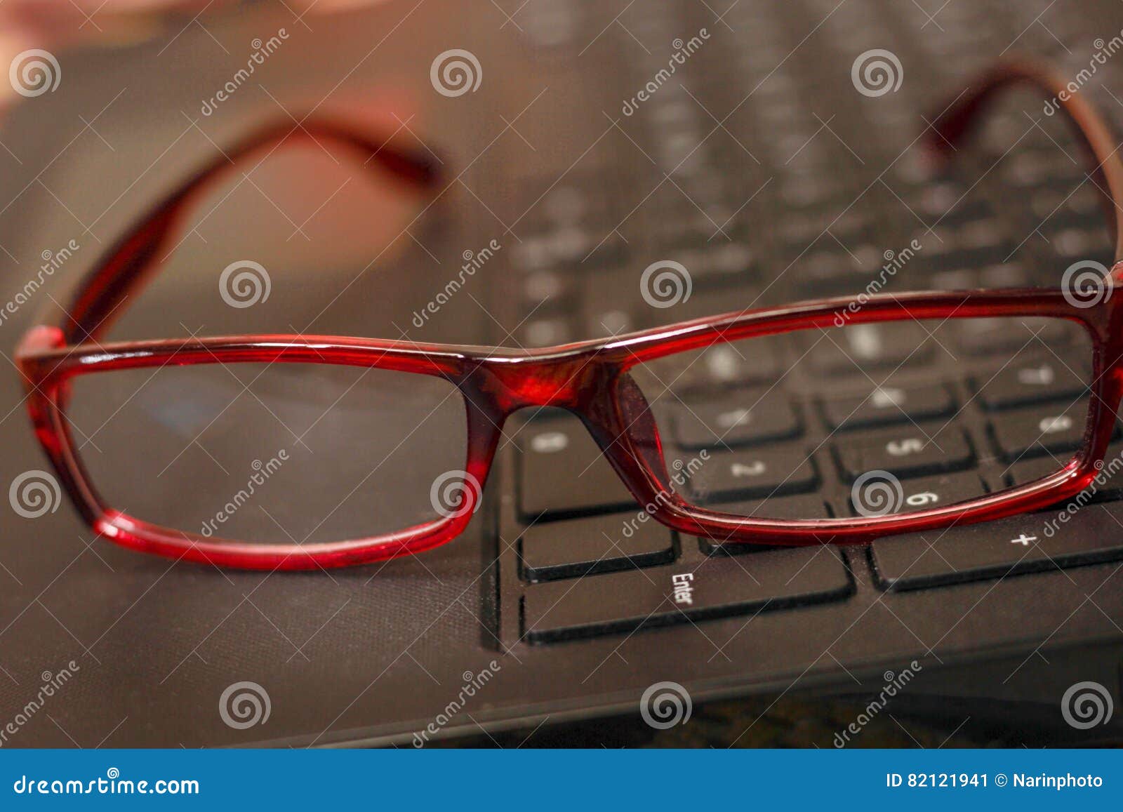 Glasses on laptop keyboard stock image. Image of laptop - 82121941