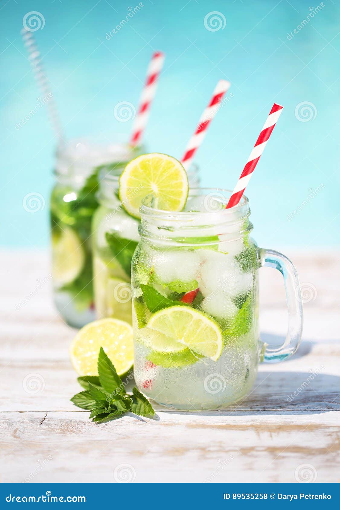 Glasses of Lime Lemonade Near Pool Stock Photo - Image of pool, lime ...