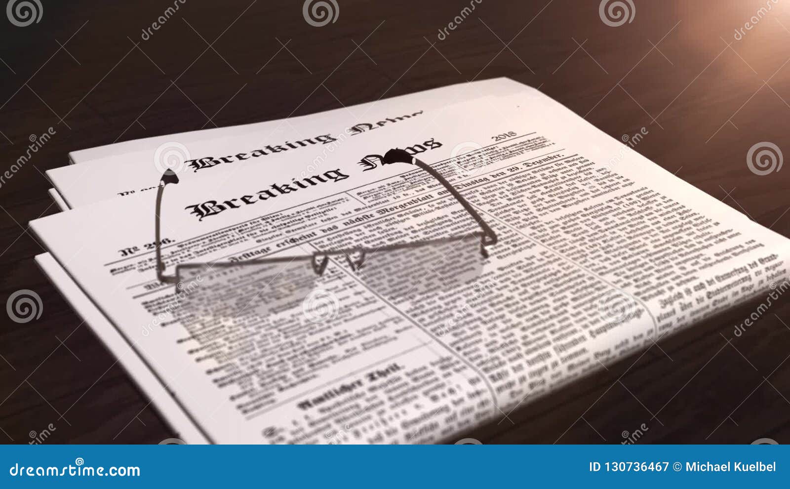 Glasses with Newspaper with the Headline Breaking News on a Table Stock ...