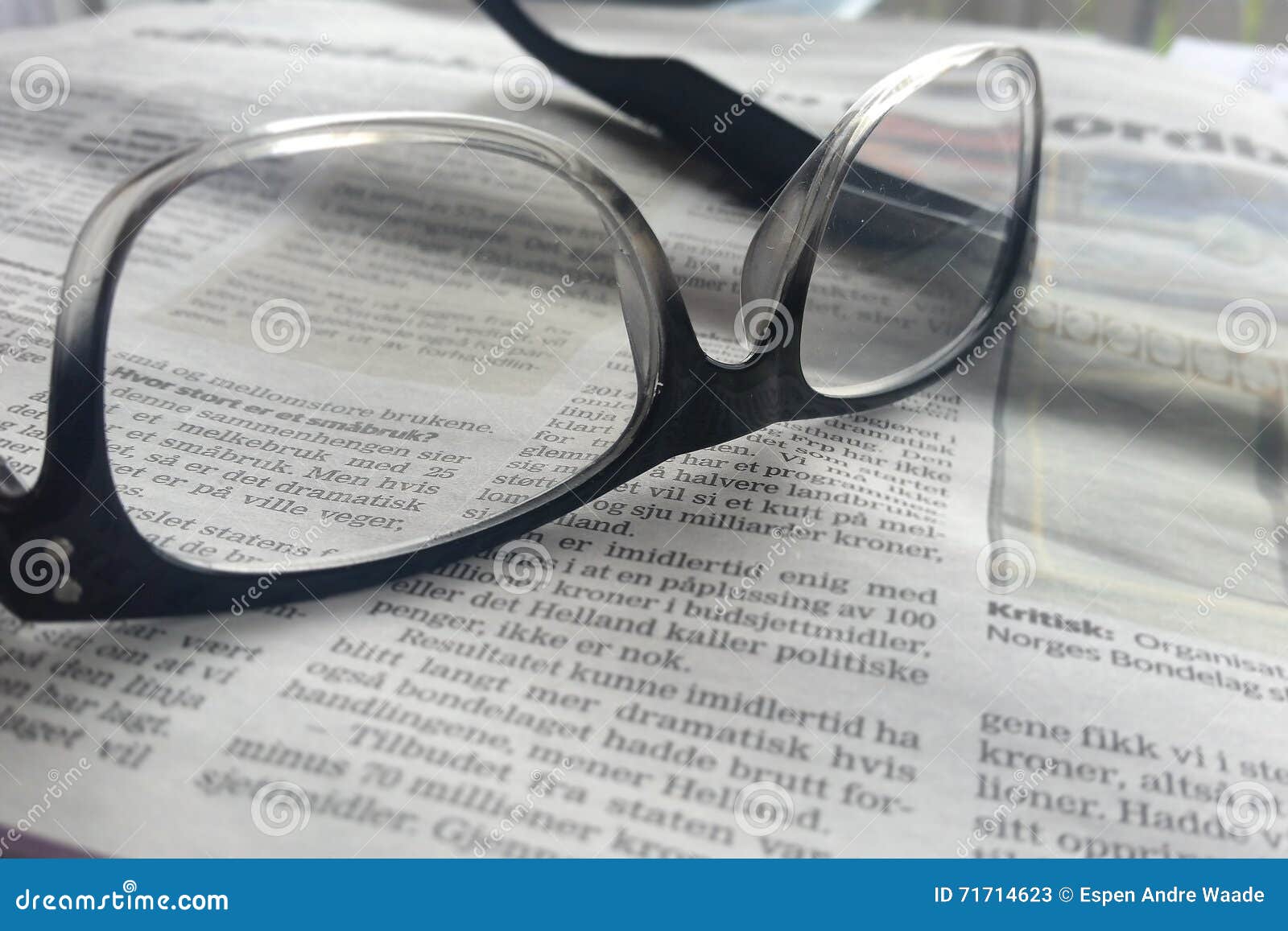 Glasses on a newspaper stock image. Image of periodical - 71714623