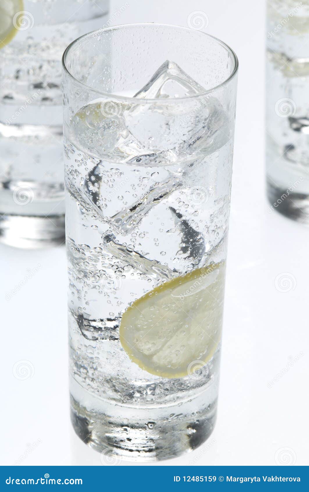 Glasses Objects with Soda Water and Ice Cubes Stock Image - Image of ...