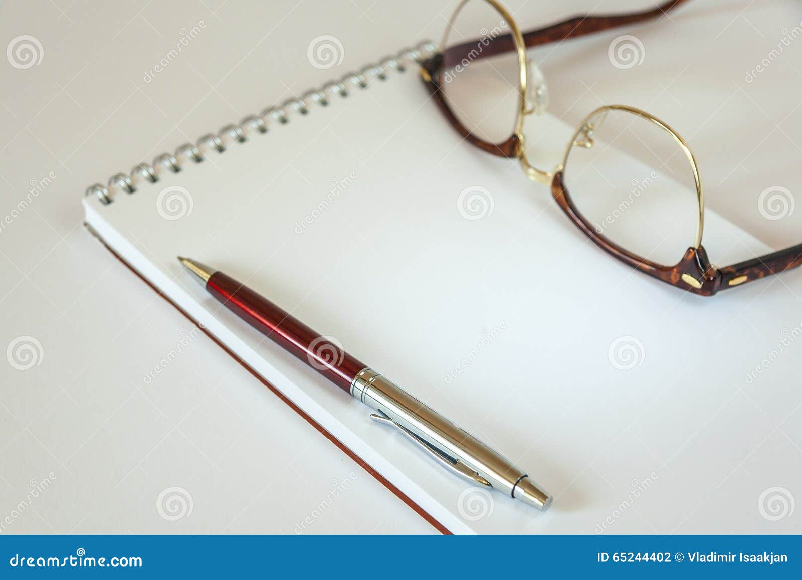 Glasses,Pen, and Notepad stock photo. Image of gold, background - 65244402