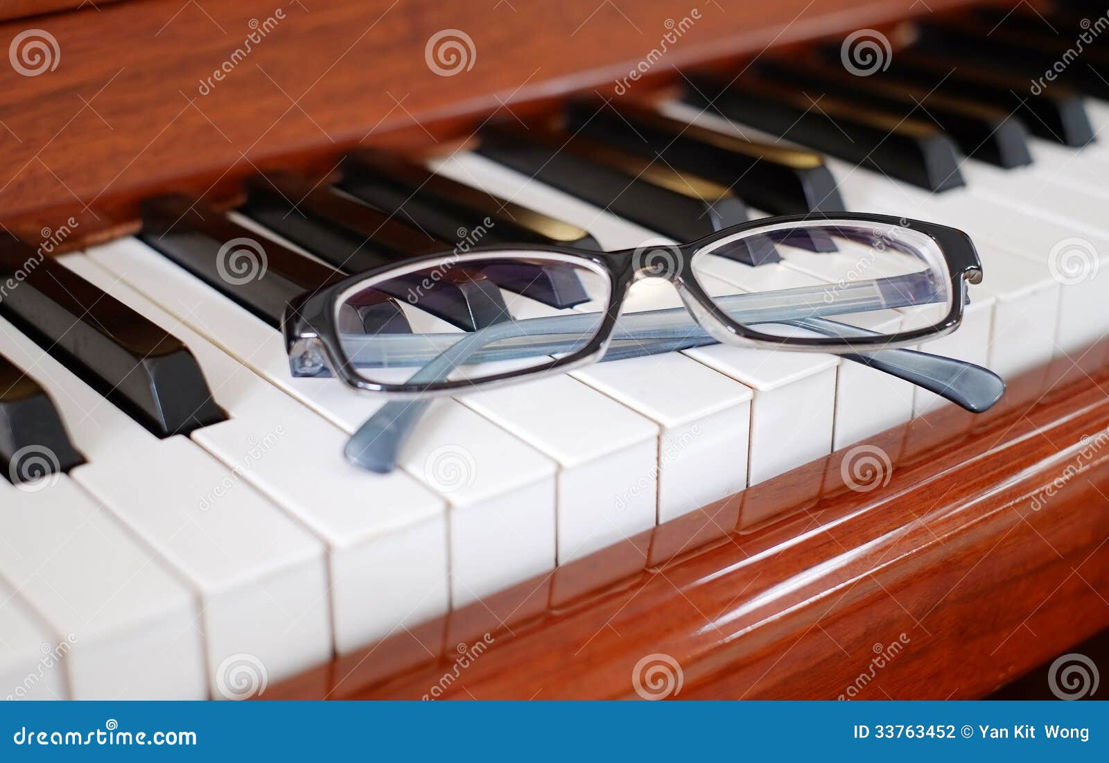 Glasses on piano stock photo. Image of chord, musical - 33763452