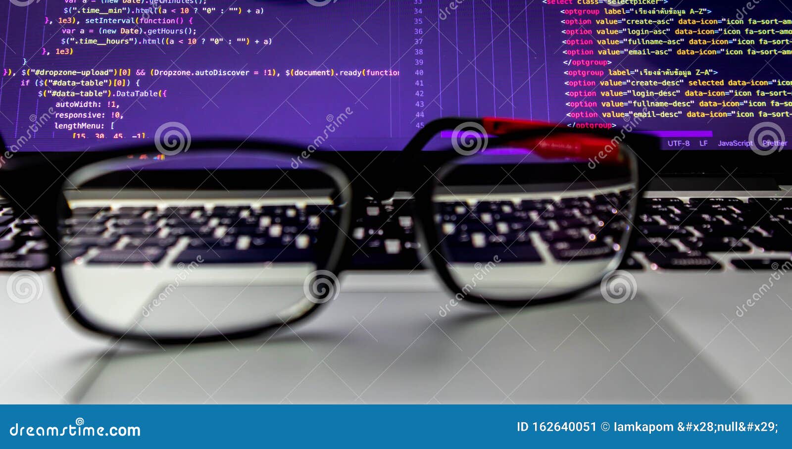 Glasses Placed on the Laptop Editorial Photo - Image of language ...