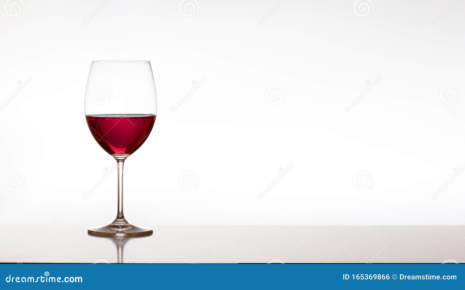 Glasses with red liquid stock photo. Image of glasses - 165369866
