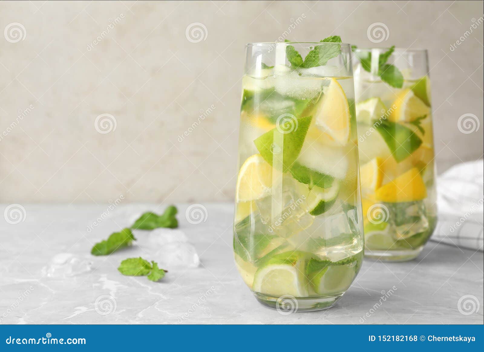 Glasses of Refreshing Lemonade on Marble Table. Summer Drink Stock ...