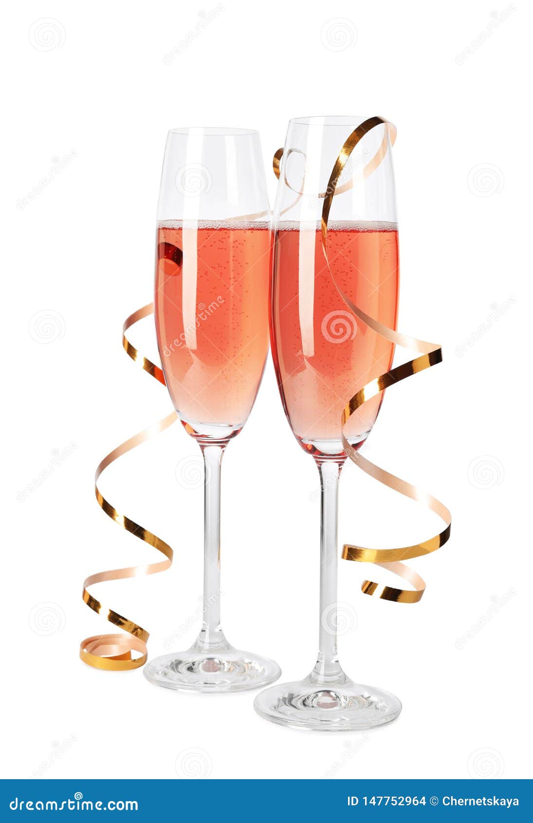 Glasses of Rose Champagne with Gold Streamer Stock Photo - Image of ...
