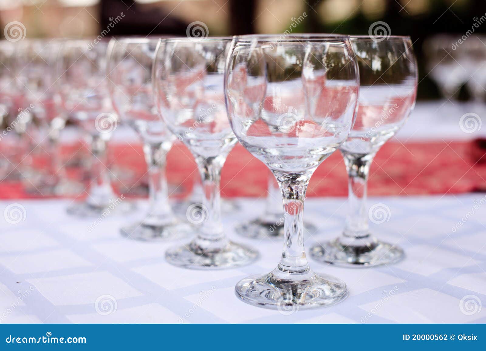 Glasses in rows outdoors stock photo. Image of dining - 20000562