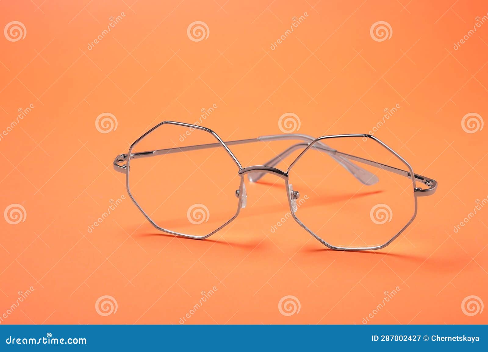 Glasses in Stylish Frame on Orange Background Stock Image - Image of ...