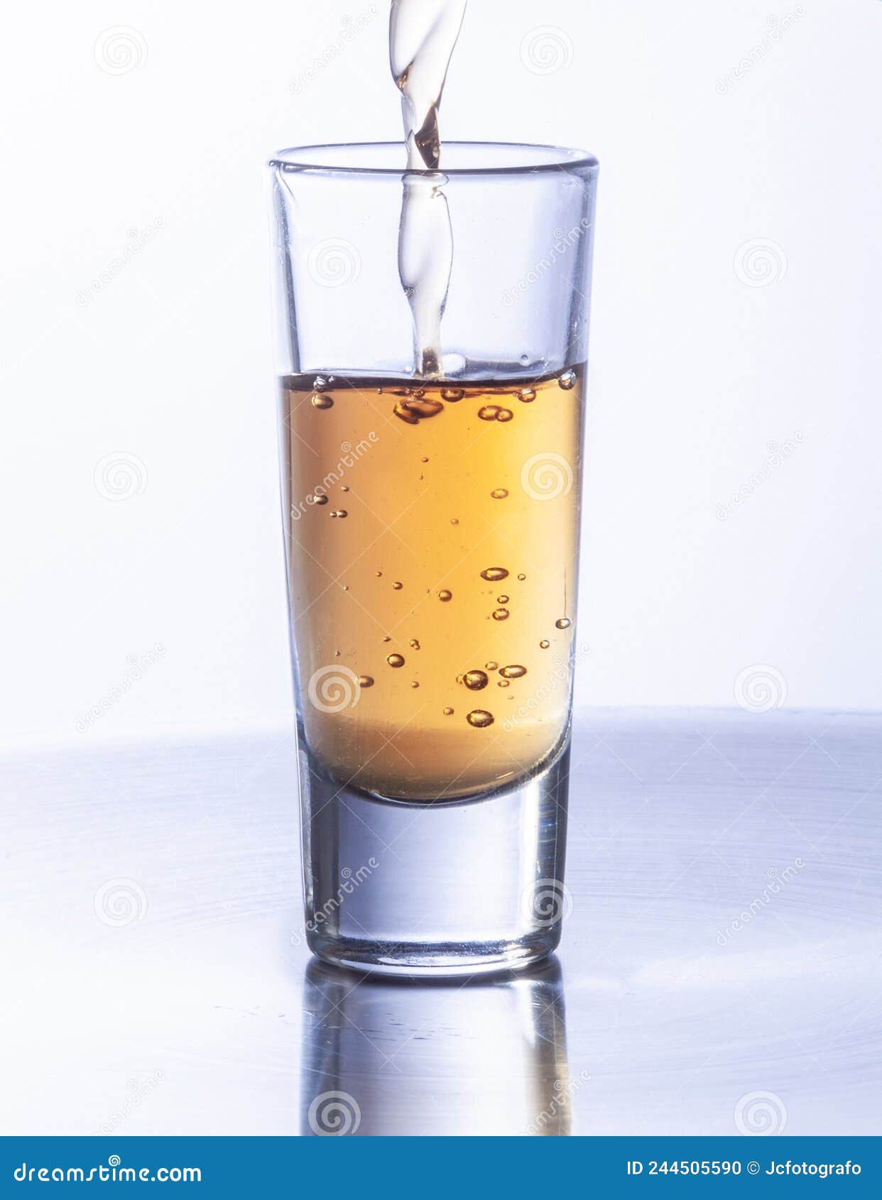 Glasses of tequila stock photo. Image of cafes, blurred - 244505590