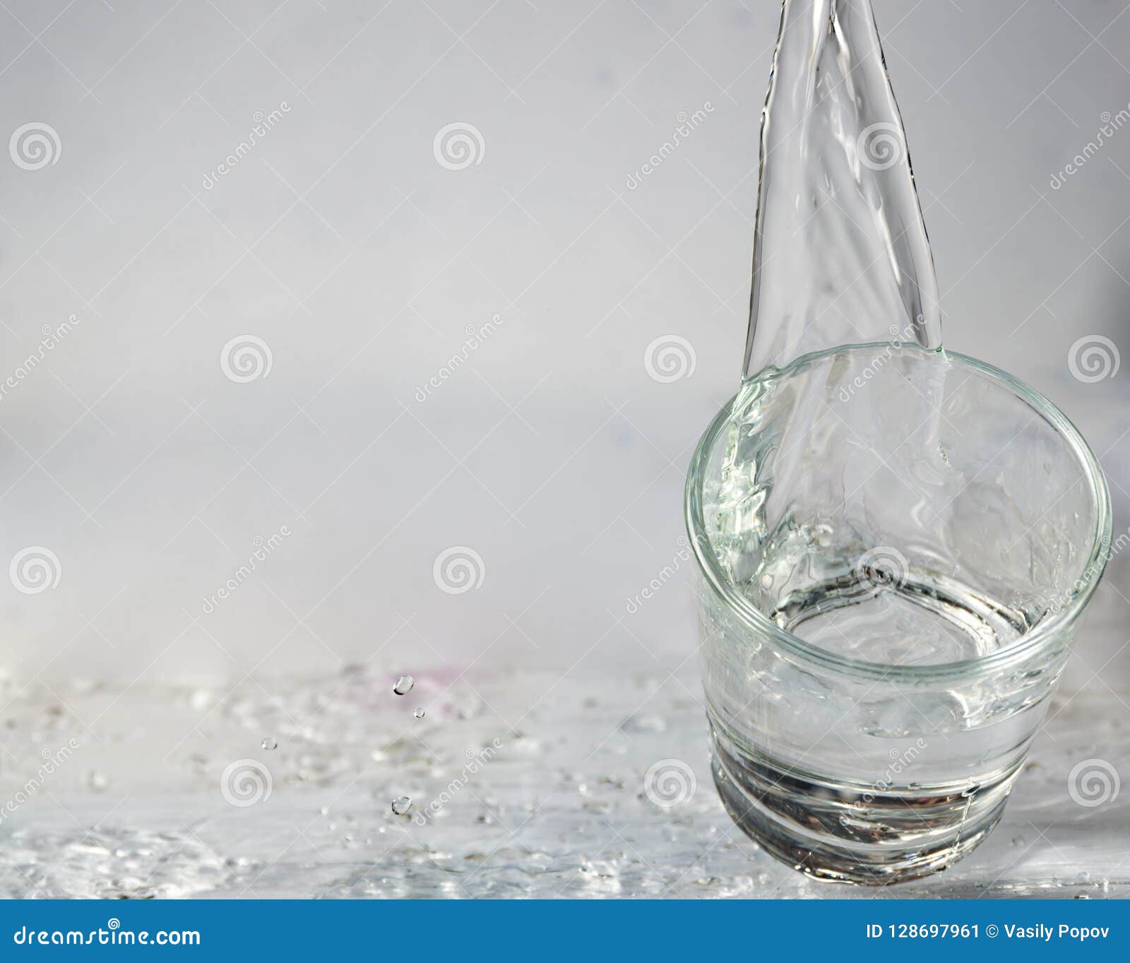 Glasses of Water Falling and Jumping with Splashes and Drops Stock ...