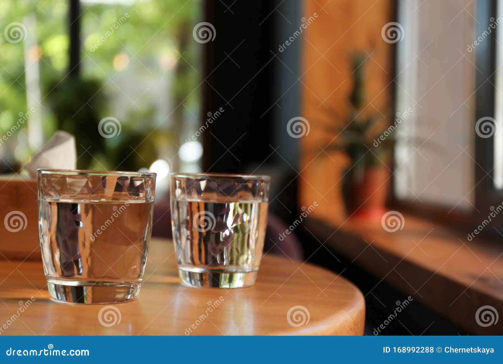 Glasses of Water on Table in Cafe. Space for Text Stock Photo - Image ...