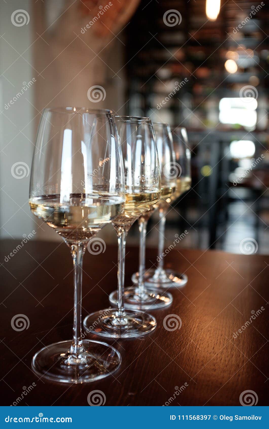 Glasses of white wine stock image. Image of drunkenness - 111568397