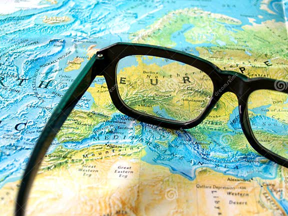 Glasses on world Map stock image. Image of commercial, closeups - 589375
