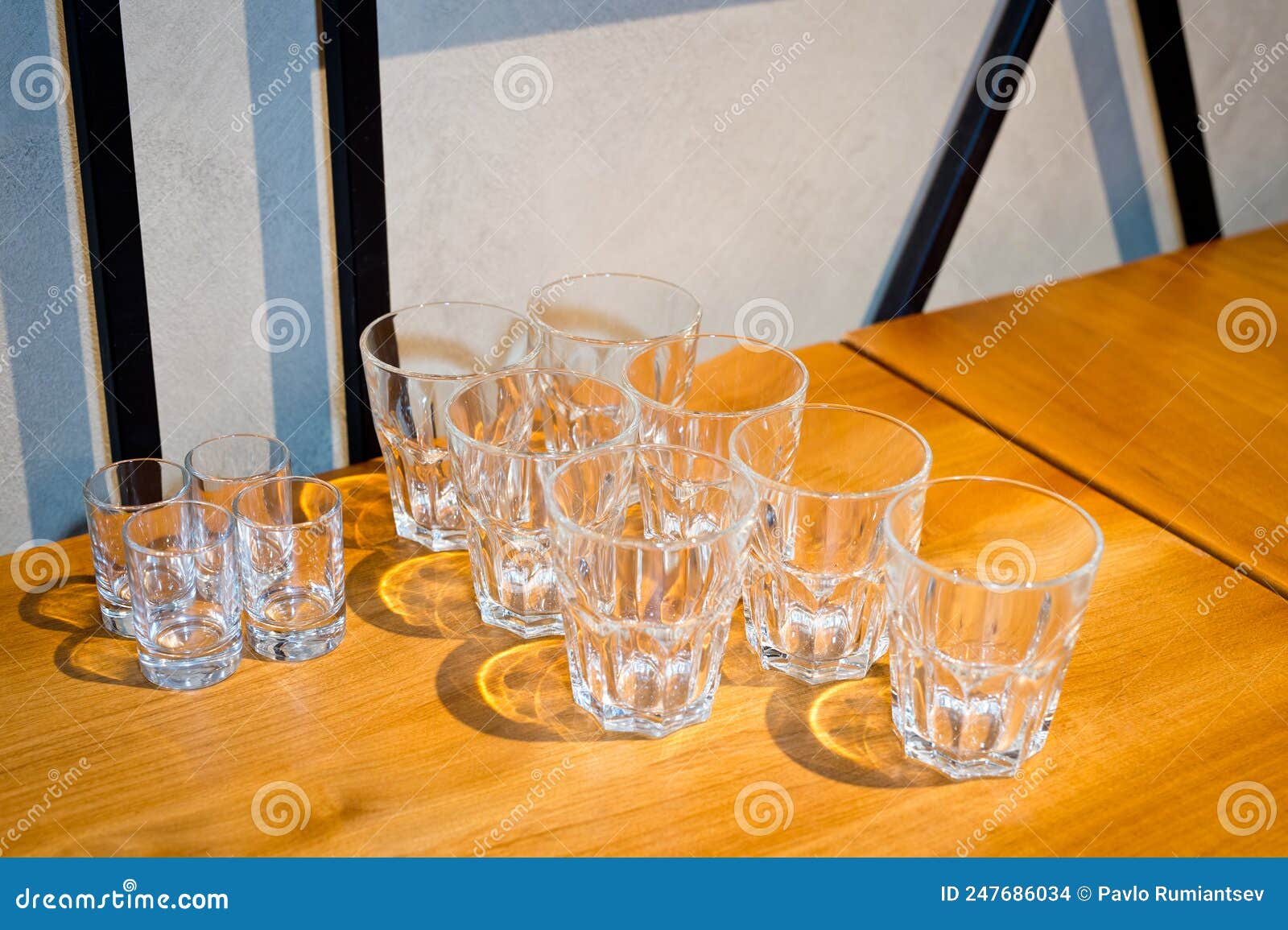 Glassware of Different Sizes for Drinks, Standing on the Wooden Surface ...