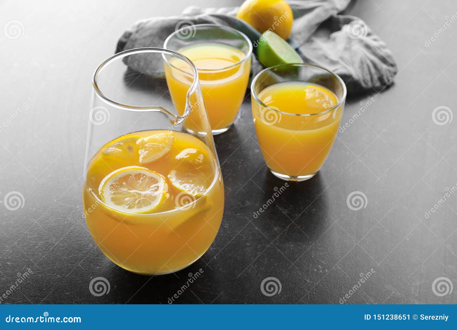 Glassware of Fresh Lemon Juice on Dark Table Stock Image - Image of ...