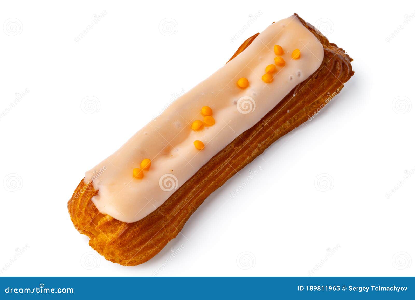 Glazed Eclair With Pieces Of Pistachios And Edible Foil On A Dark Wood ...