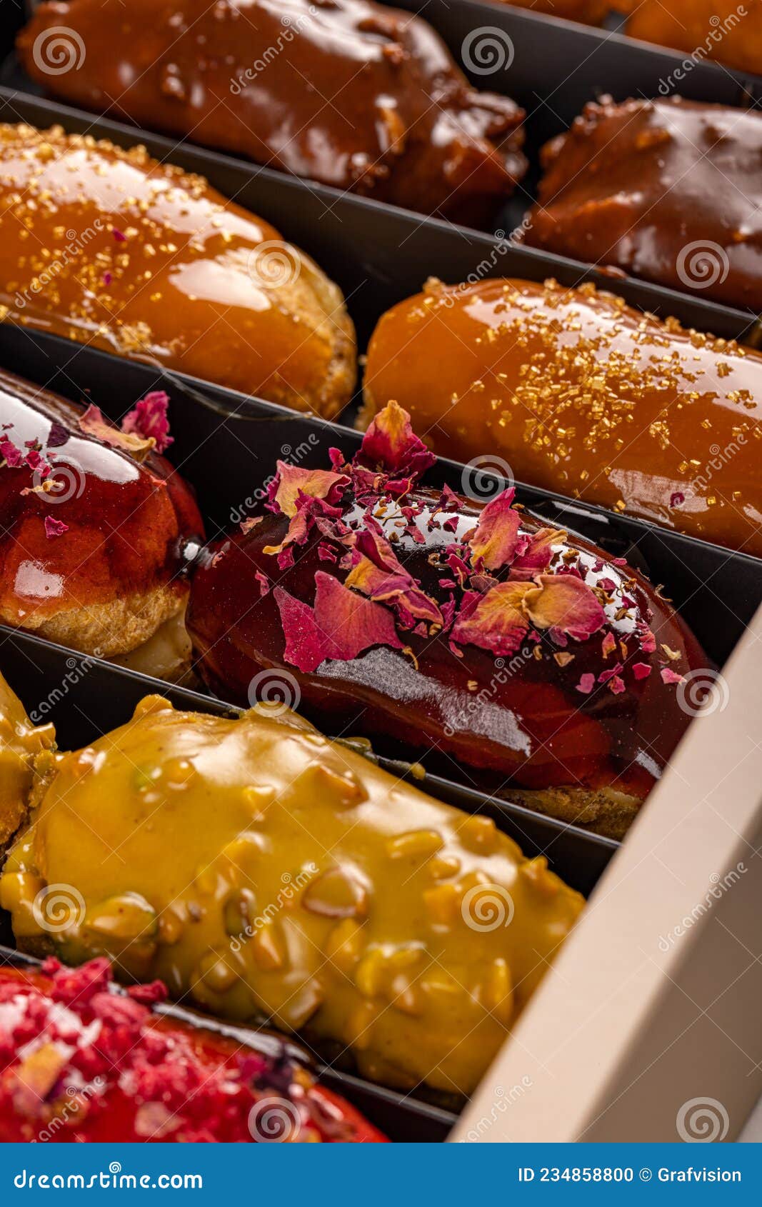 Glazed mini eclairs stock photo. Image of colorful, confectionery ...