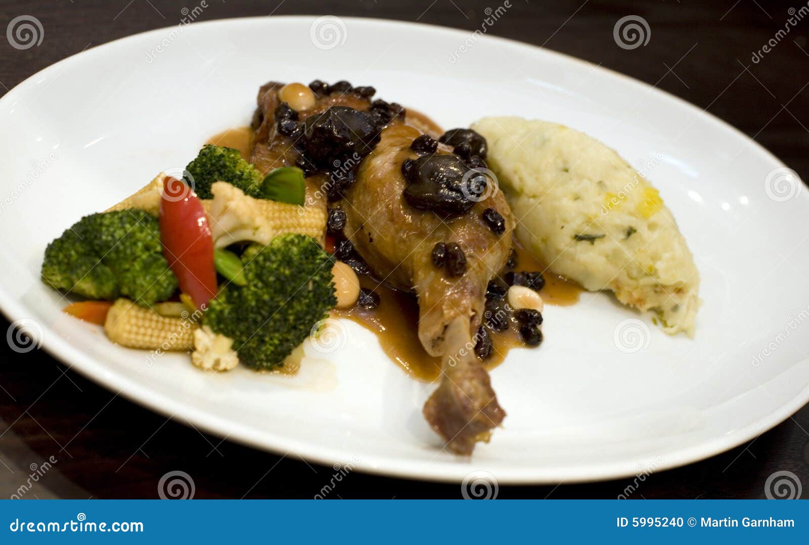 Glazed Roasted Duck Leg with Dried Fruit Stock Photo - Image of cook ...
