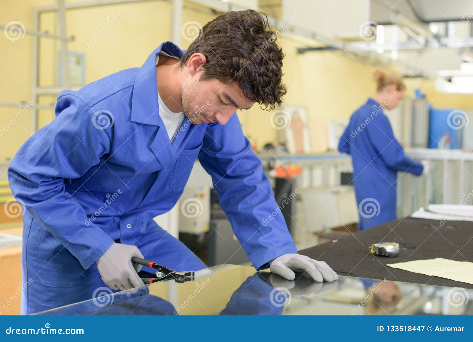 Glazier cutting a glass stock image. Image of design - 133518447