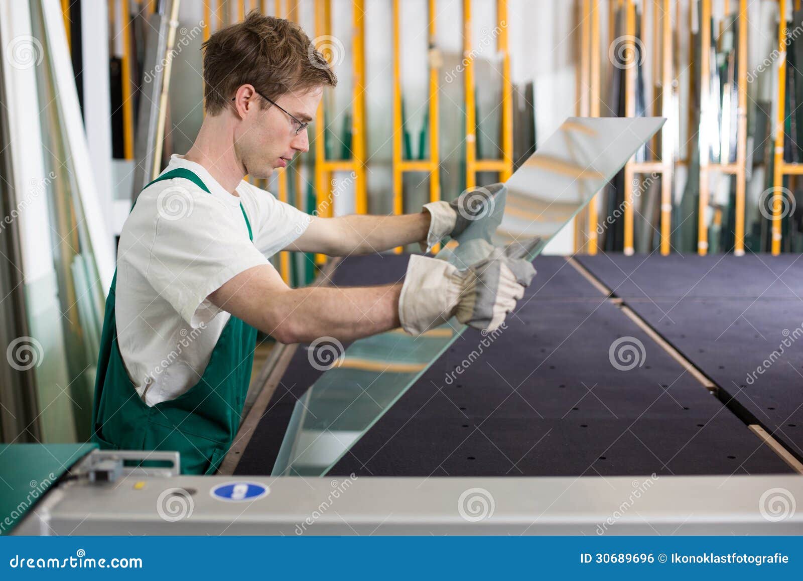 Glazier Handling Piece of Glass in Workshop Stock Photo - Image of ...