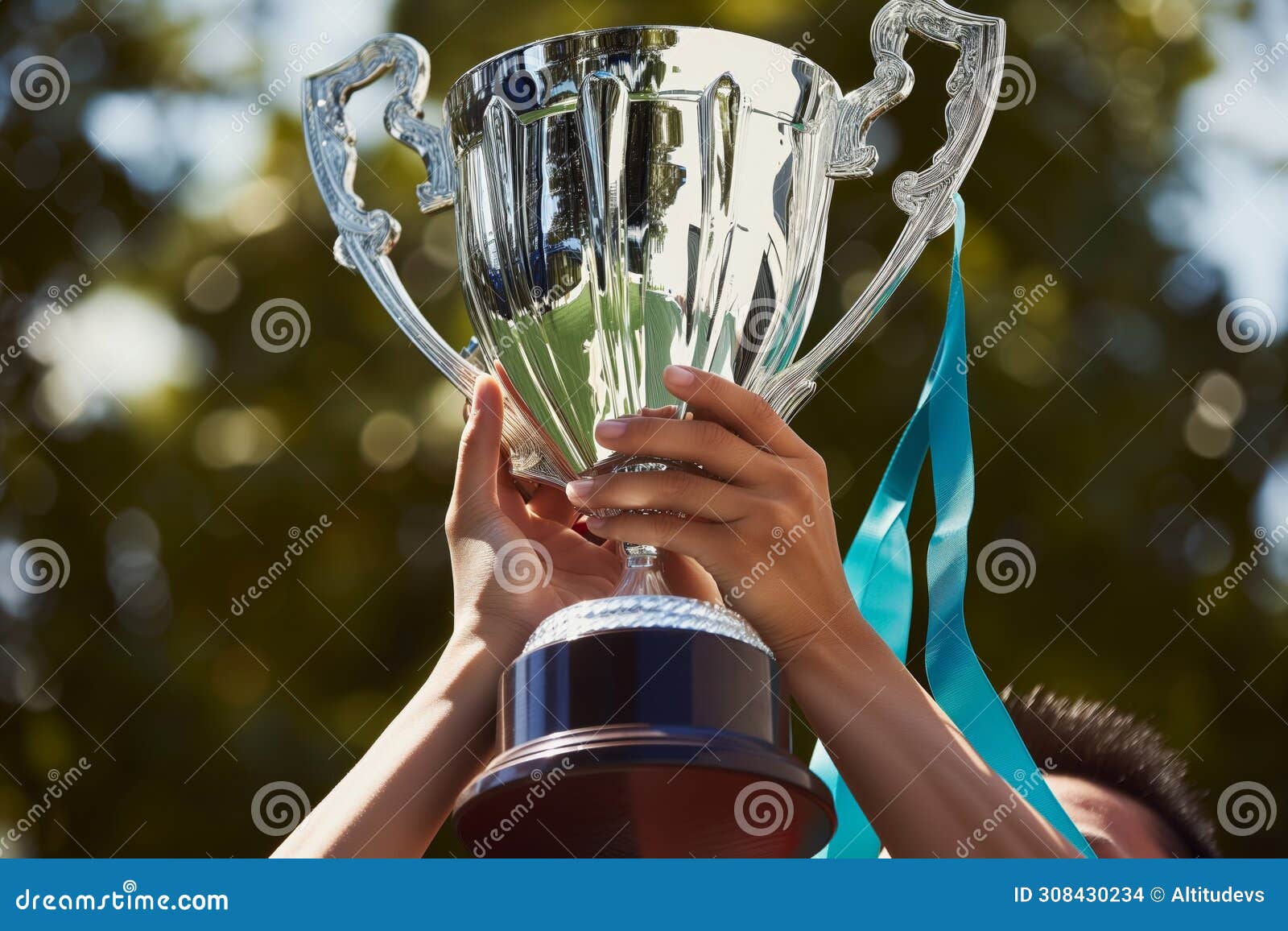 Gleaming Silver Trophy Being Lifted by a Winners Hands Stock Photo ...