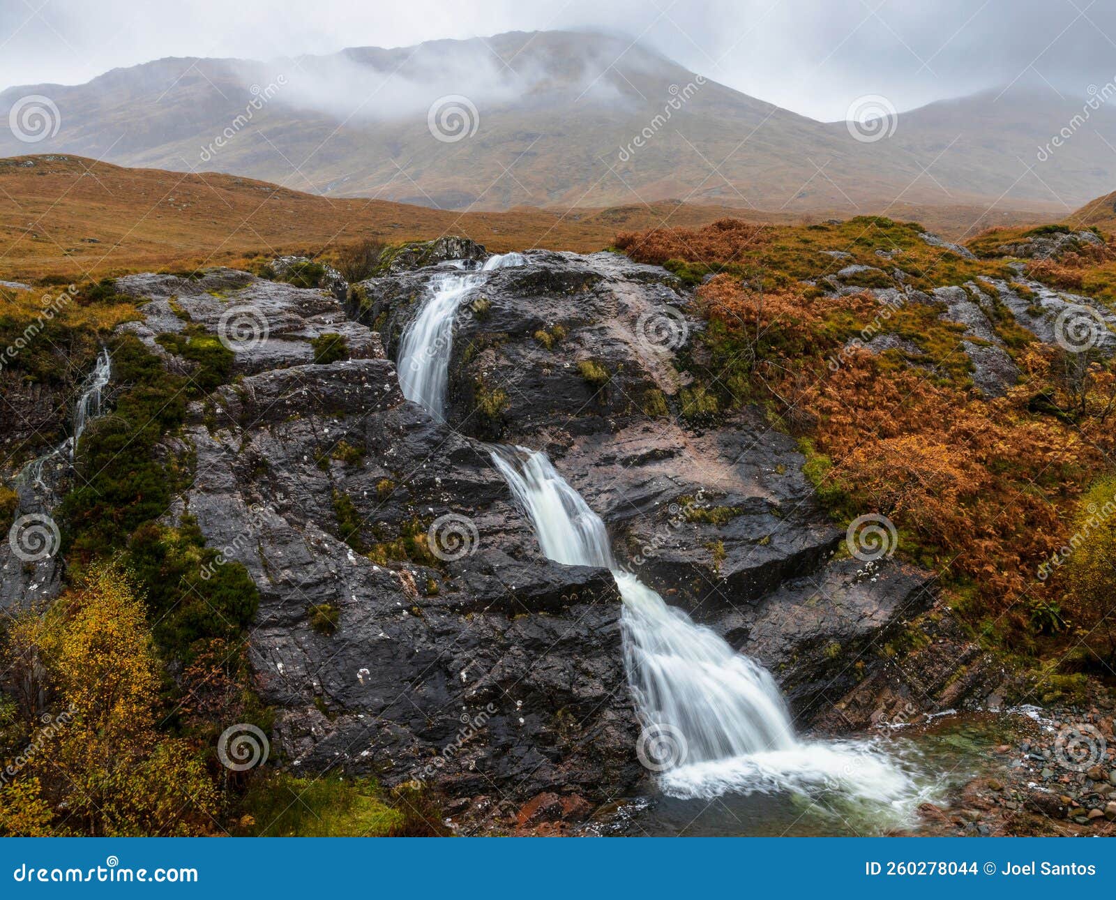 Glencoe Waterfall with Mountains in the Background Stock Photo - Image ...
