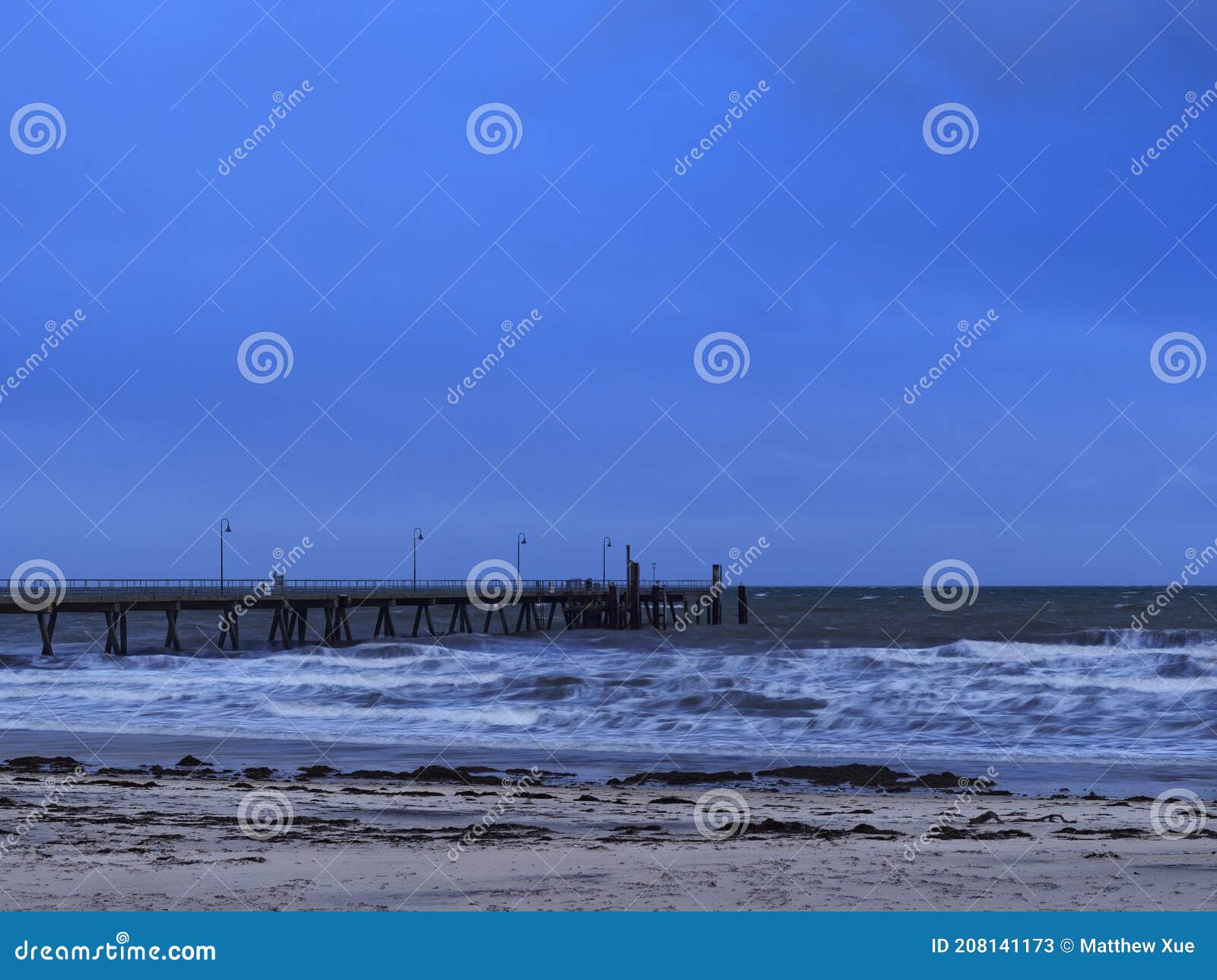 Glenelg Jetty and Beach Under the Storm with Thick Cloud and Blue Tone ...