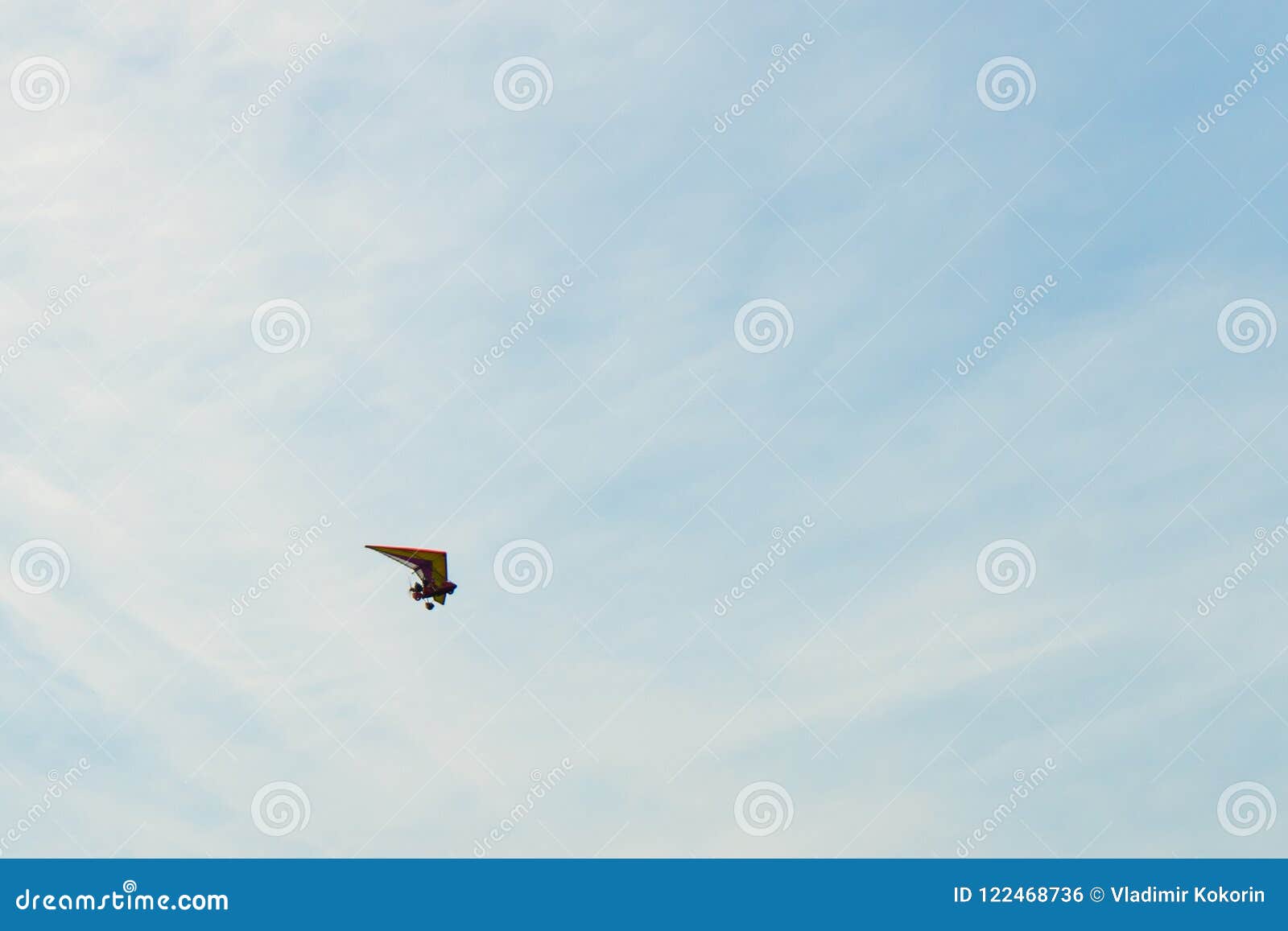 Glider High in the Sky. Glider on a Blue Sky Background Stock Photo ...