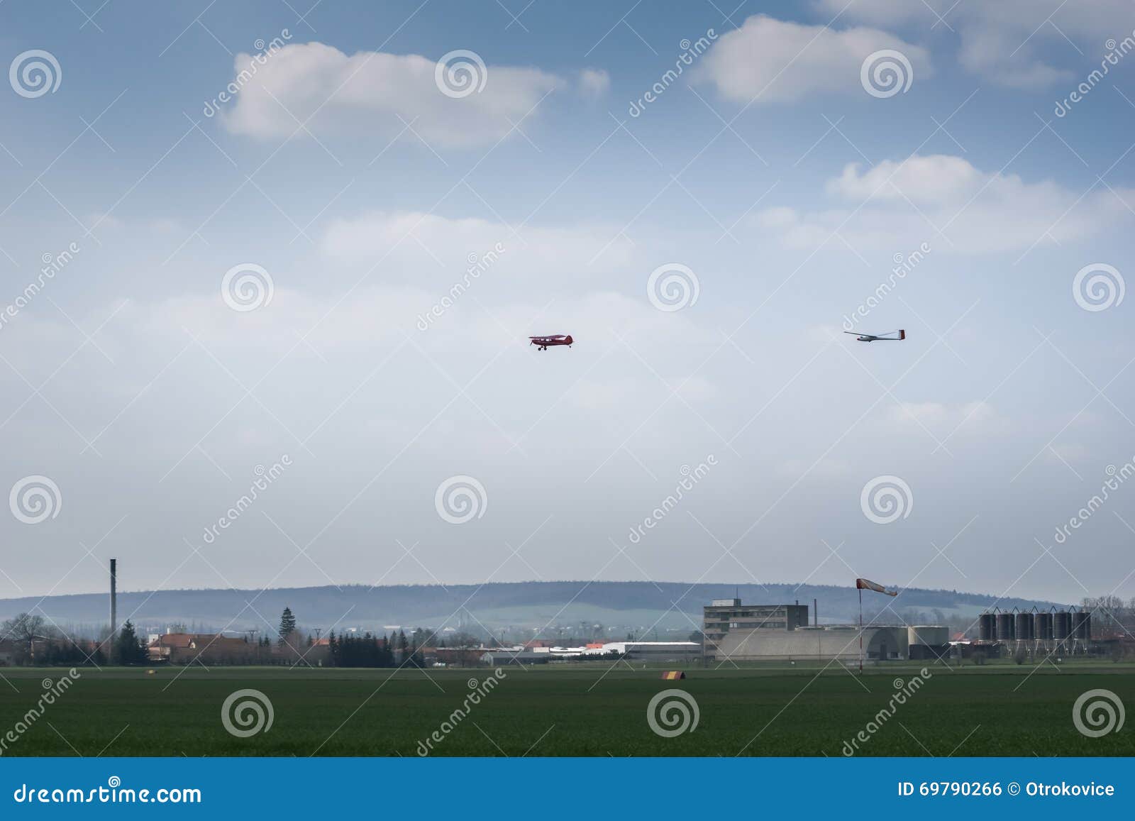 Glider Pulled By Motor Aircraft Stock Photo | CartoonDealer.com #143493348