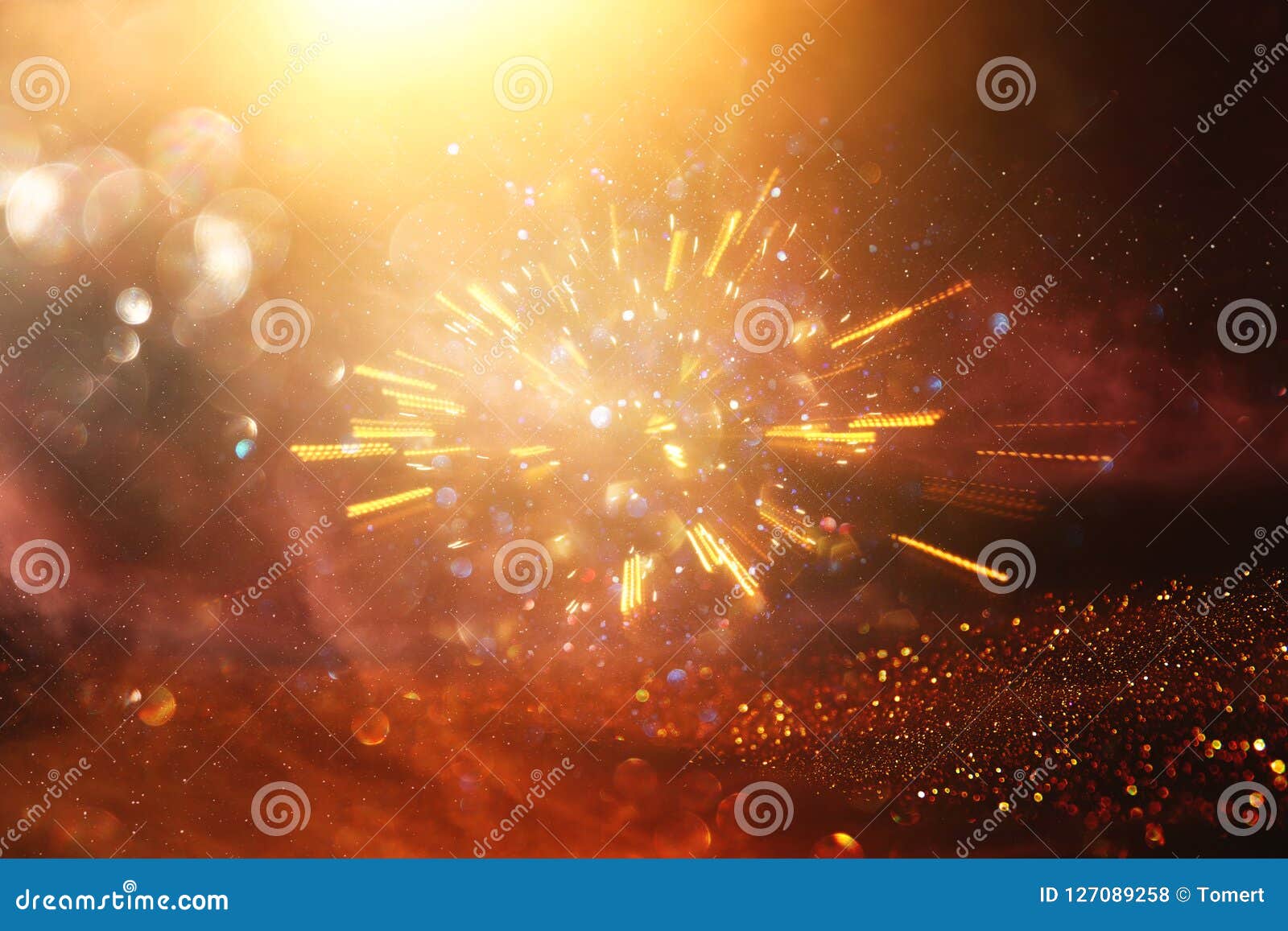 Glitter Vintage Lights Background. Gold Light Burst. Defocused. Stock ...