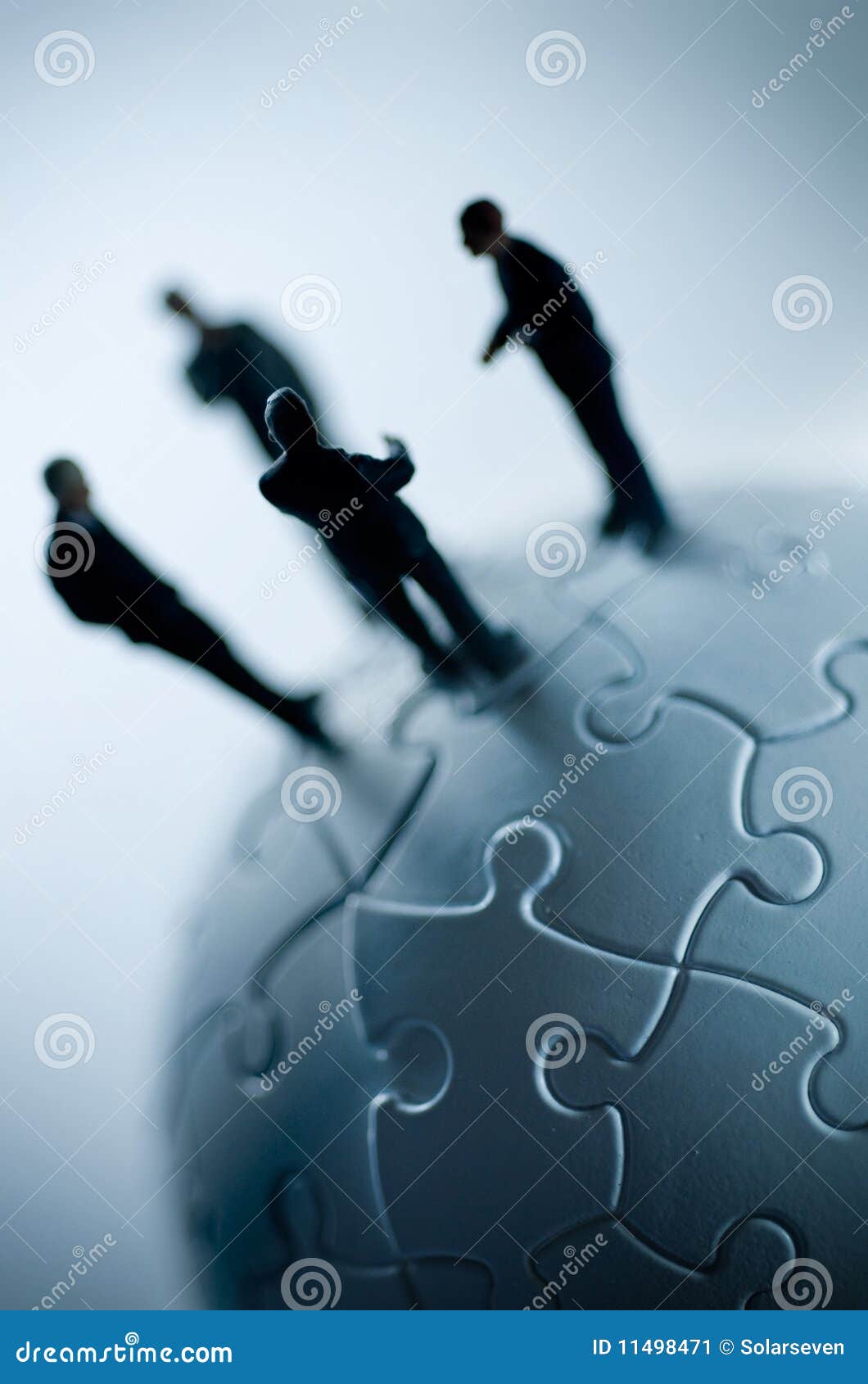 Global Team on a Puzzle stock image. Image of playing - 11498471