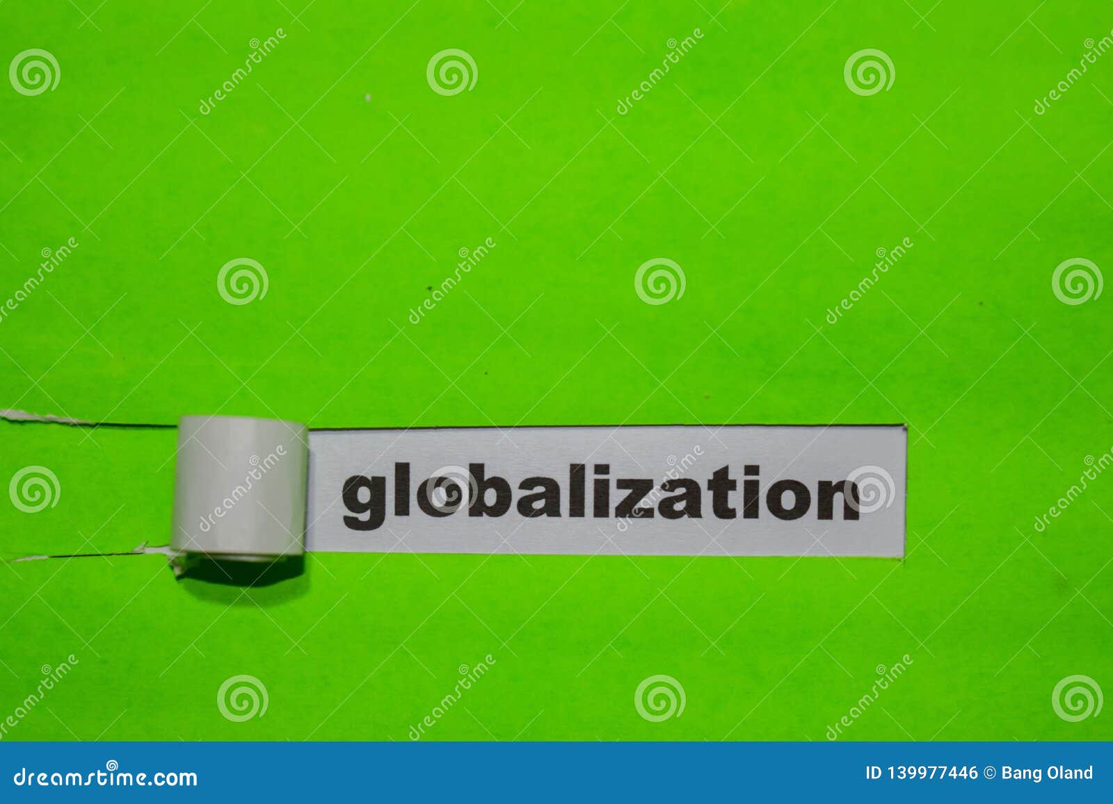 Globalization, Inspiration and Business Concept on Green Torn Paper ... Globalization, Inspiration and Business Concept on Green Torn Paper ...